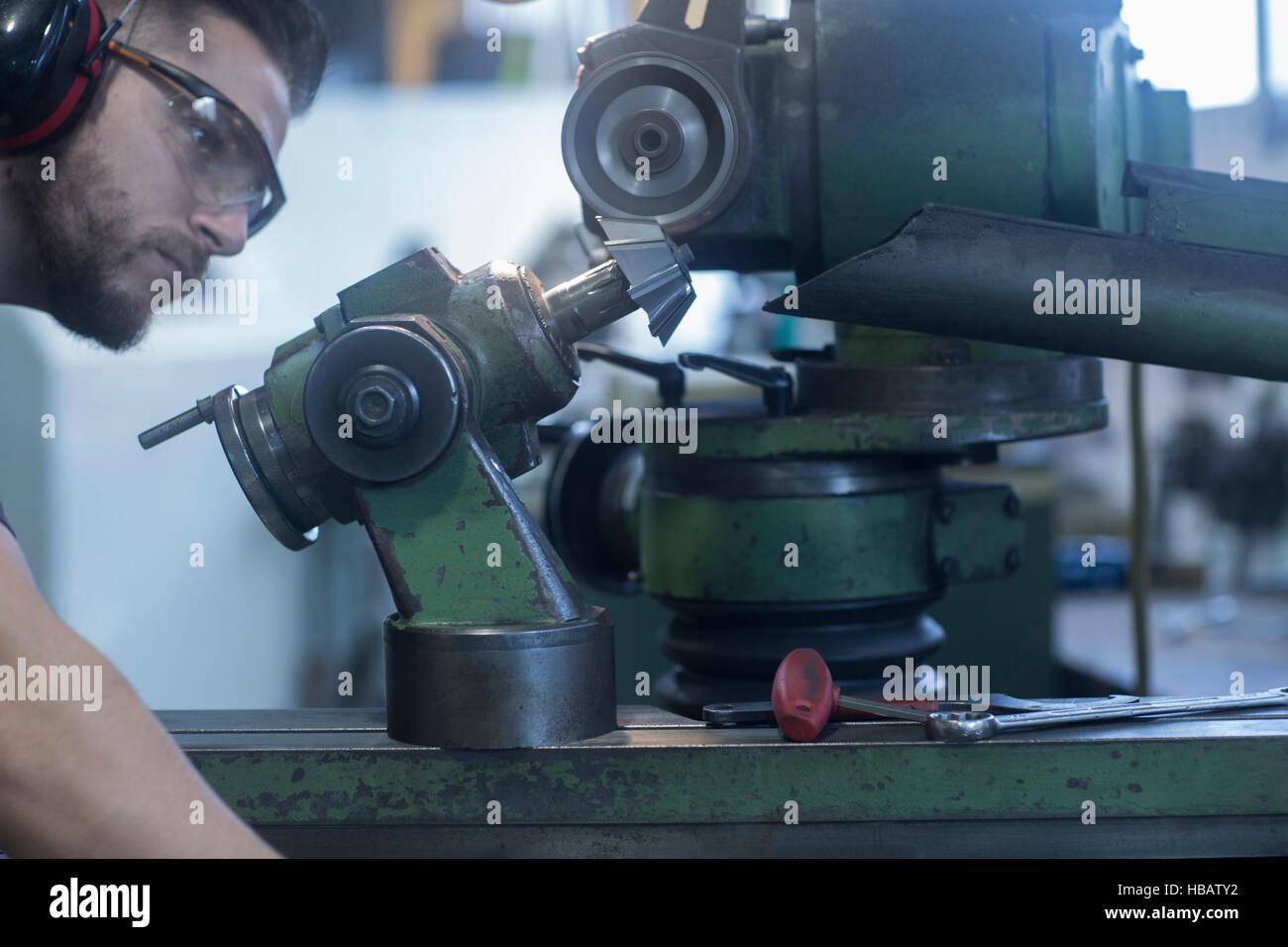 Man working grinding machine close hi-res stock photography and images ...