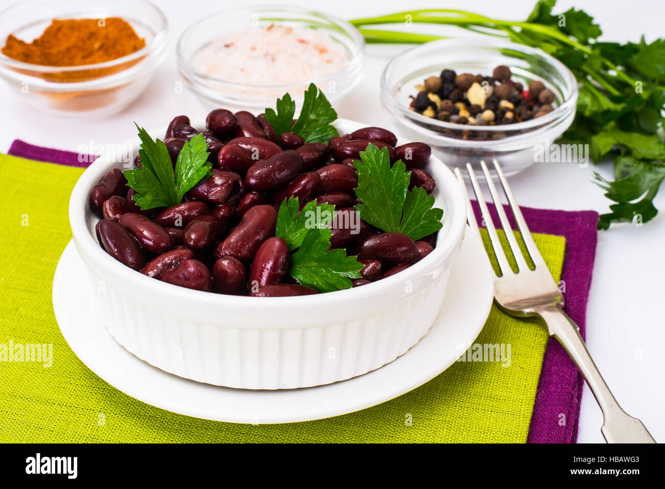 Beans, spices and curry in white salad bowl. Studio Photo Stock Photo ...