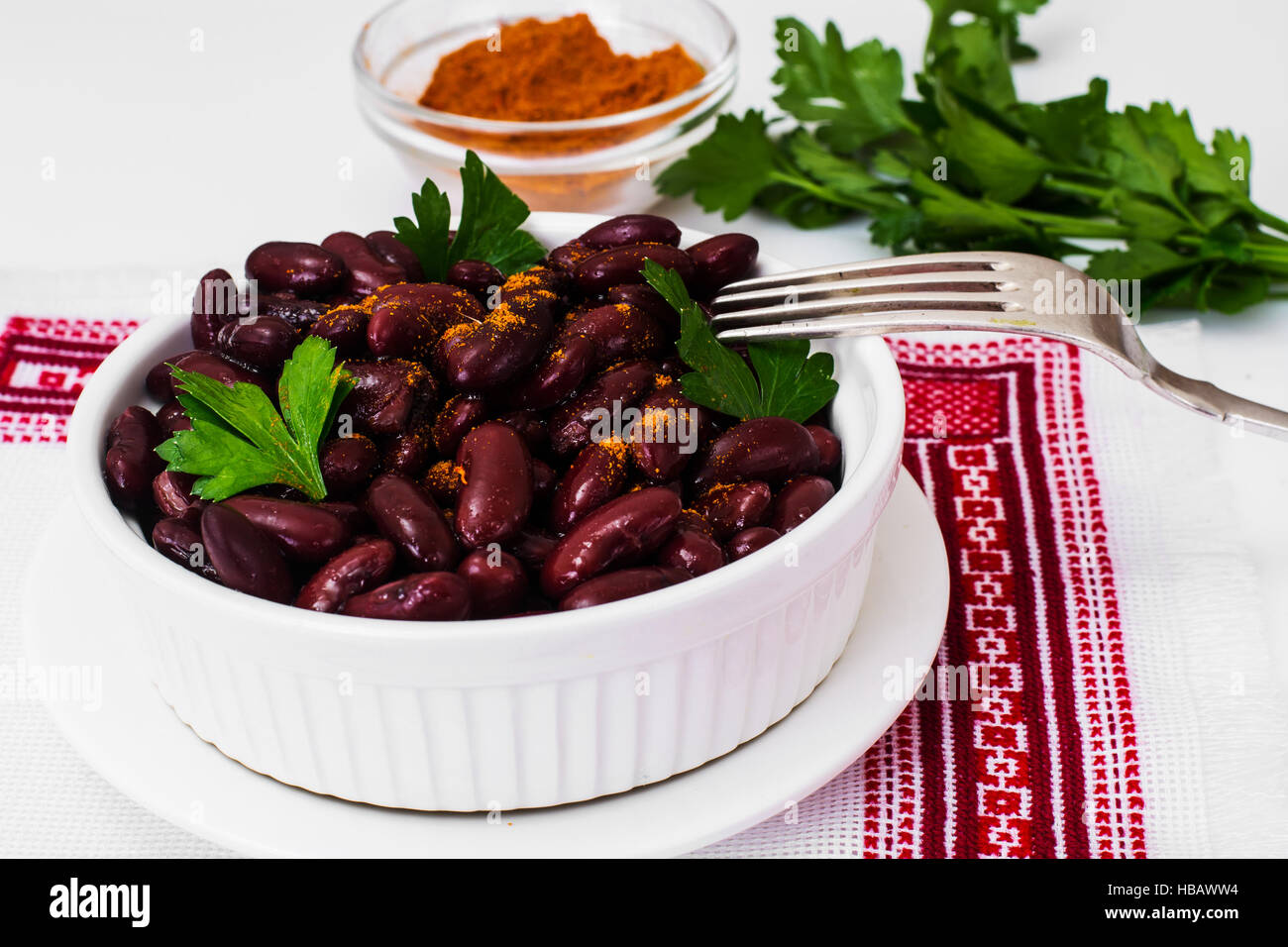 Beans, spices and curry in white salad bowl. Studio Photo Stock Photo ...