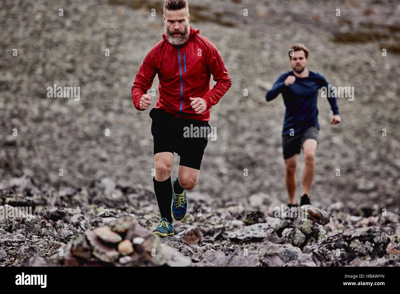 Running men hi-res stock photography and images - Alamy