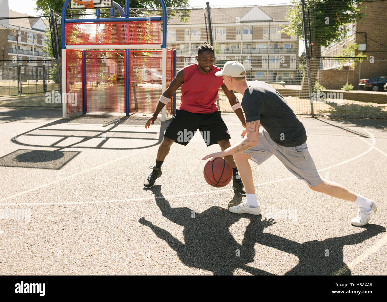 Two basketball players on court hi-res stock photography and images - Alamy