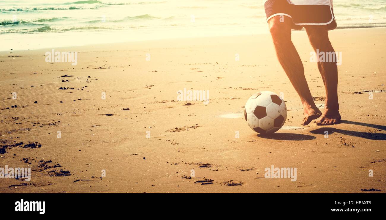 Man Beach Summer Holiday Vacation Football Concept Stock Photo - Alamy