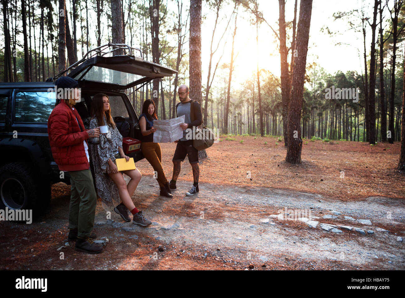 Friends Reading Map Traveling Destination Camping Concept Stock Photo ...