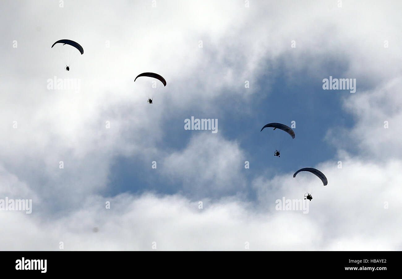 Paramotorist Sacha Dench (right) the 'Human Swan' arrives in Dover ...