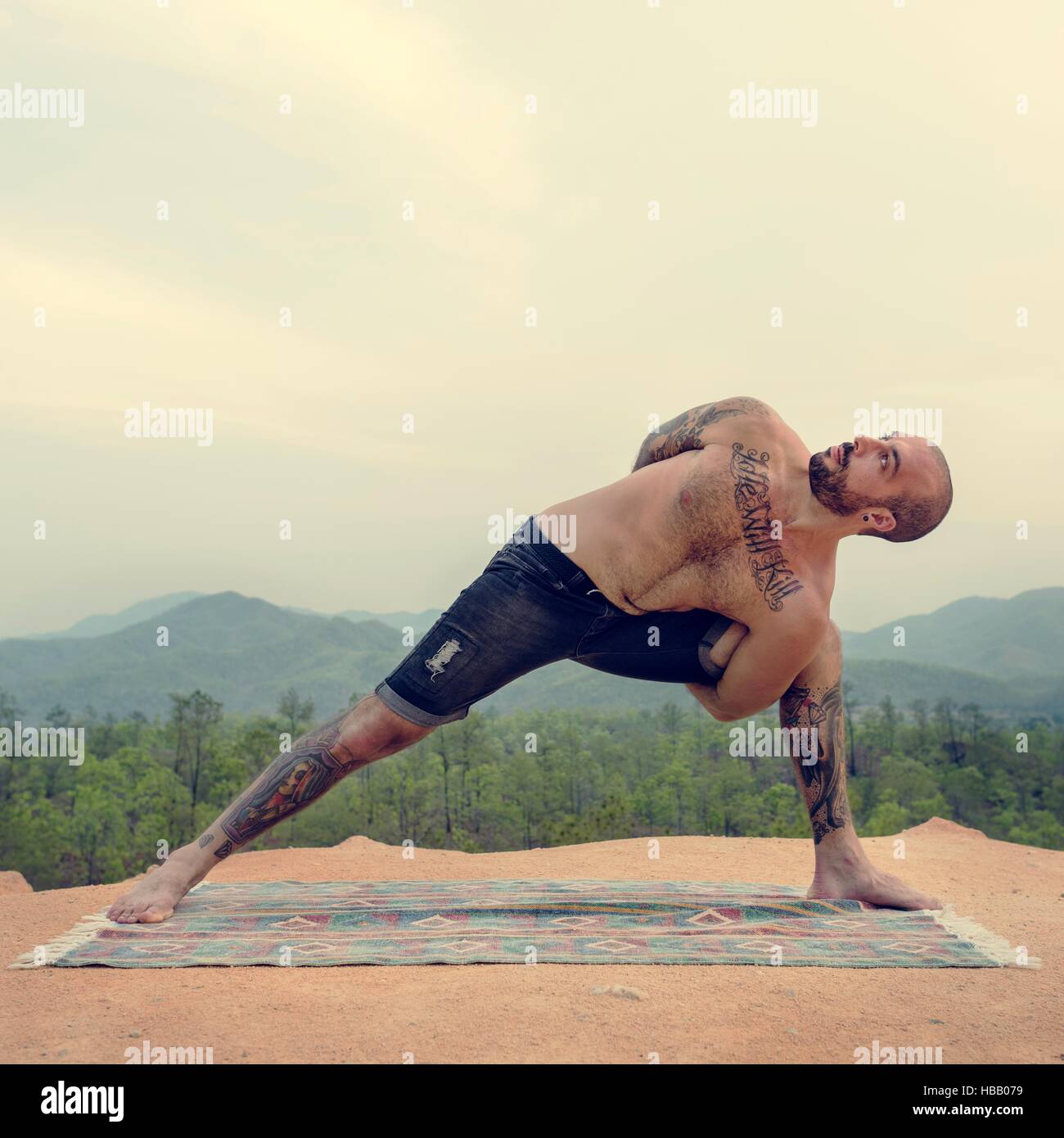 Man Doing Yoga Exercise Concept Stock Photo - Alamy