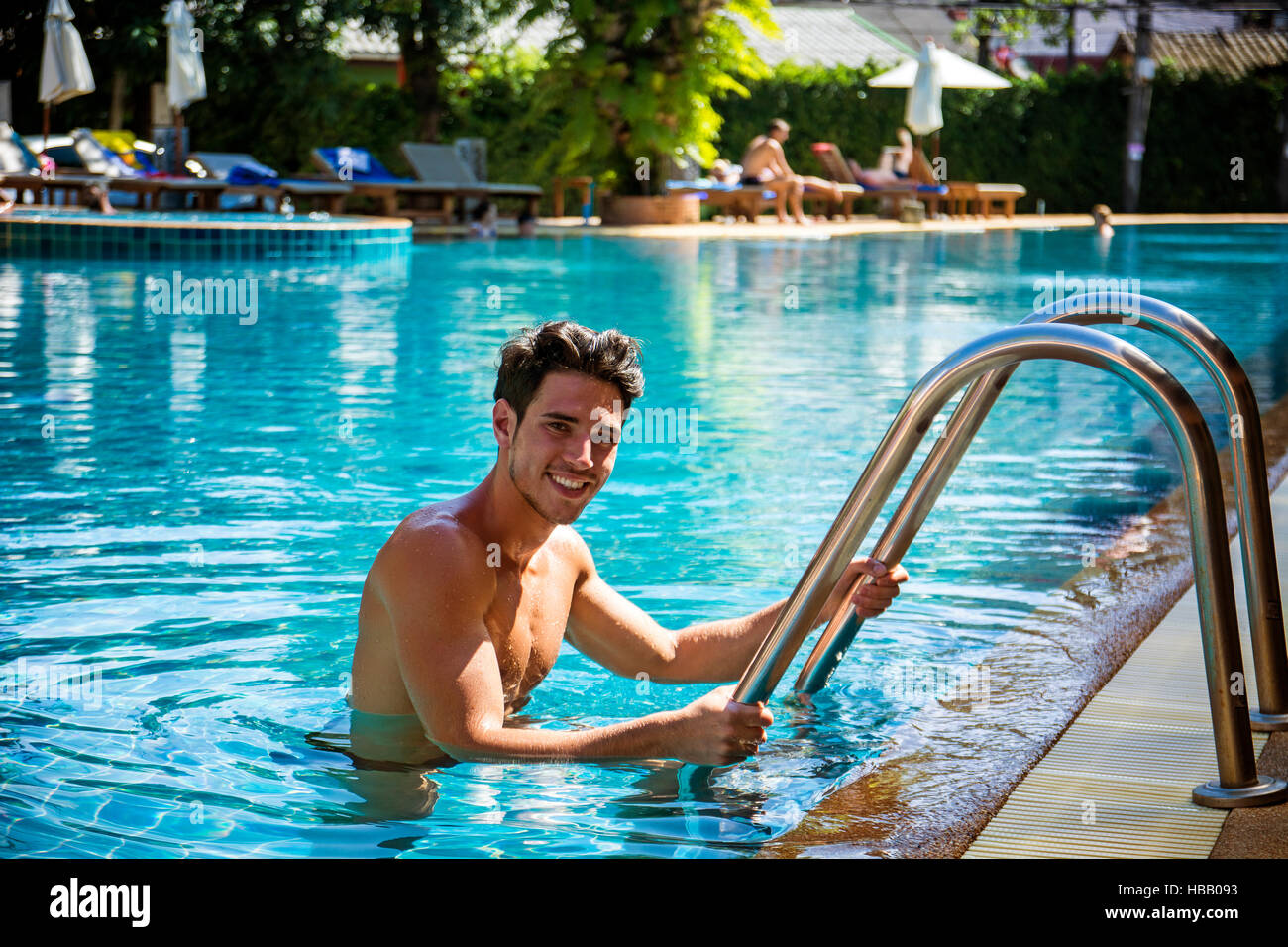 Man swimming pool outdoors holiday hi-res stock photography and images ...
