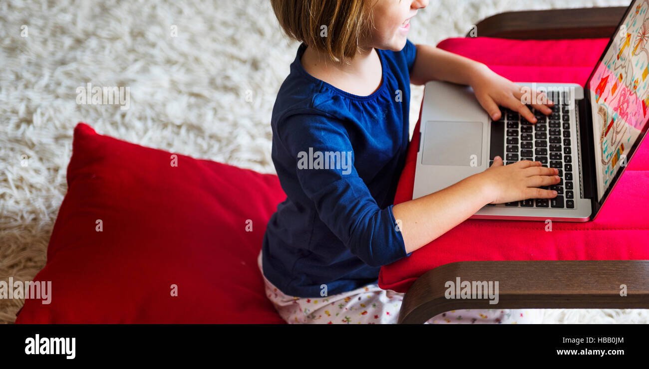 Little Girl Using Device Concept Stock Photo - Alamy