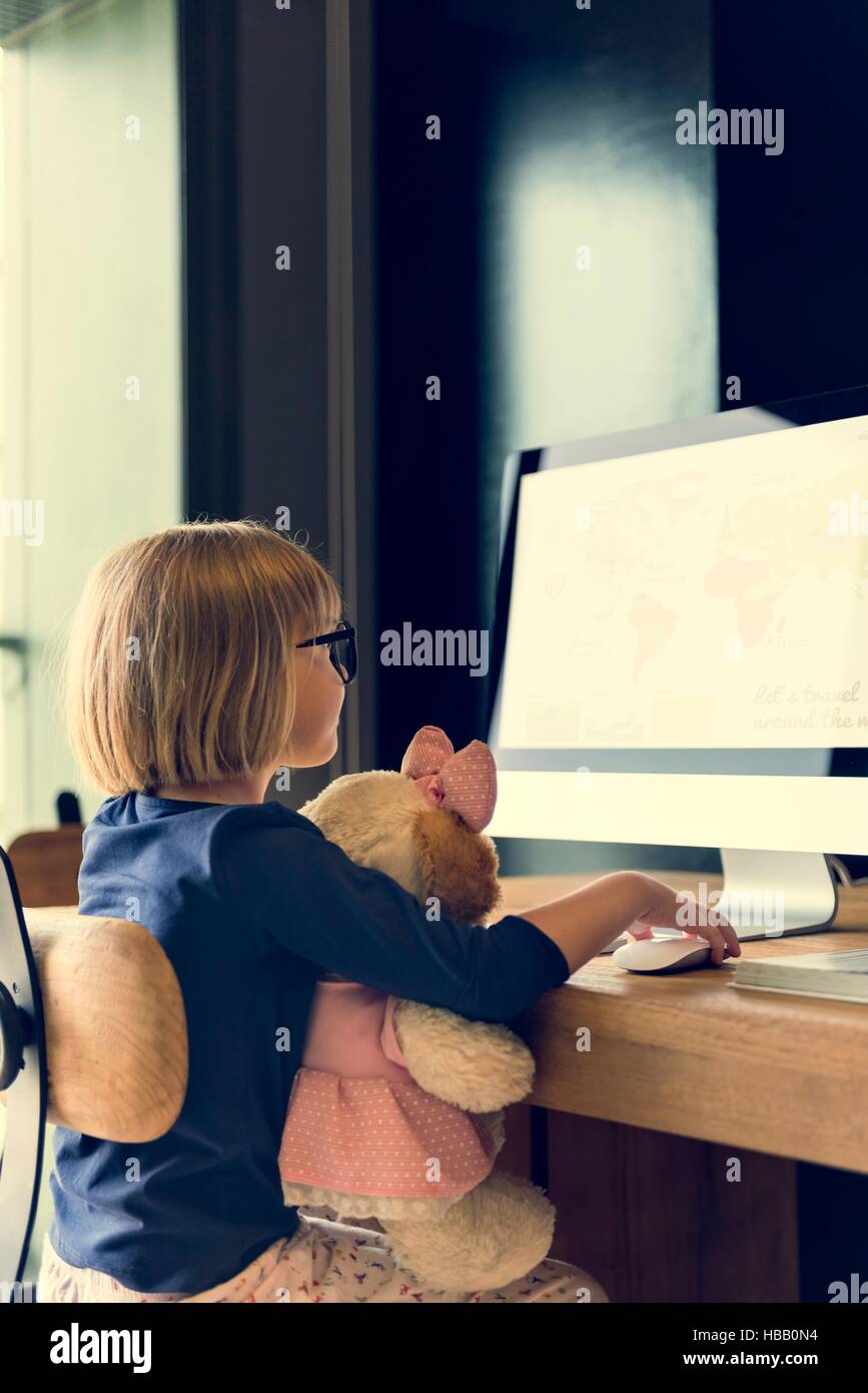 Little Girl Using Computer Concept Stock Photo - Alamy