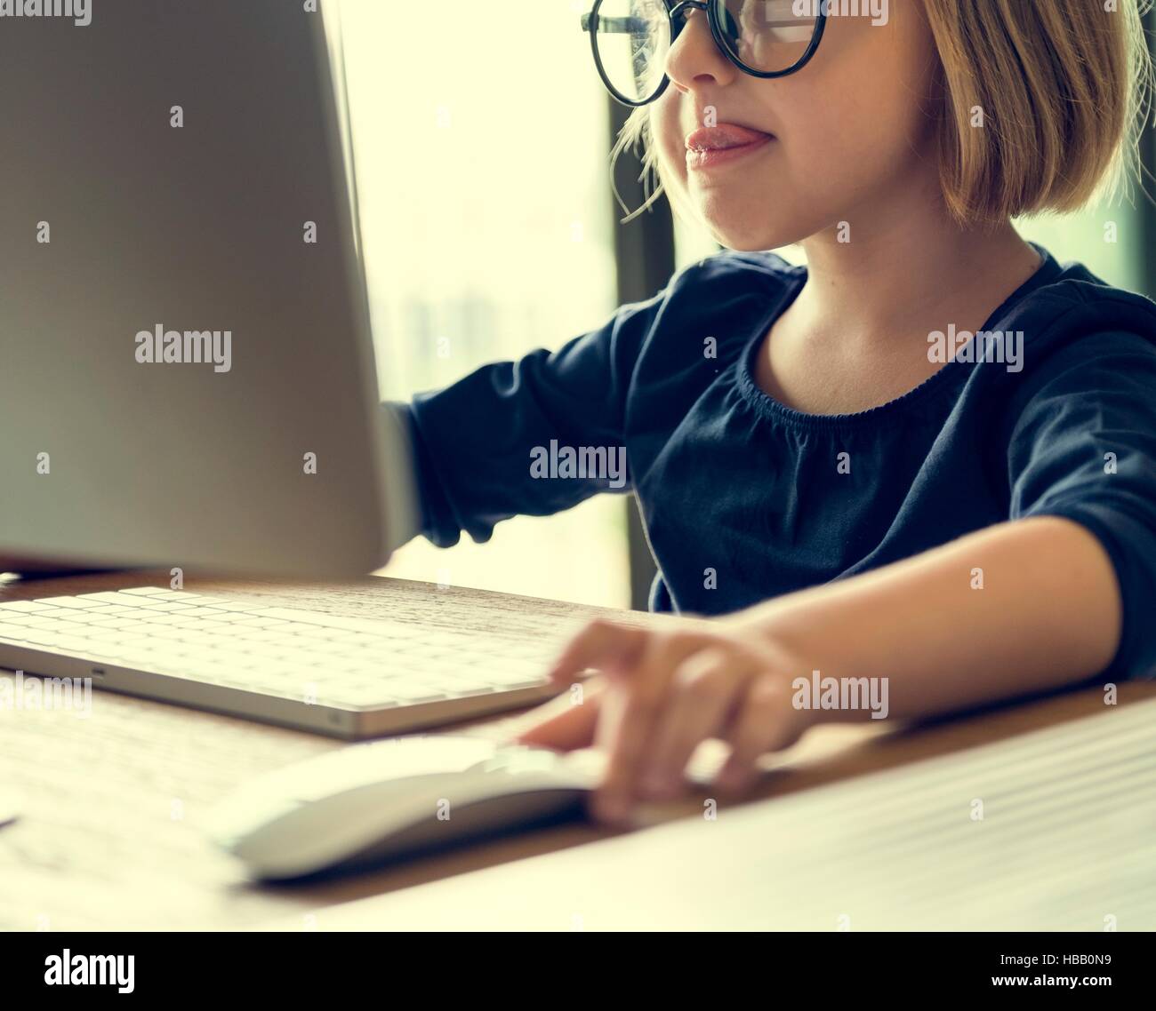 Little Girl Using Computer Concept Stock Photo - Alamy