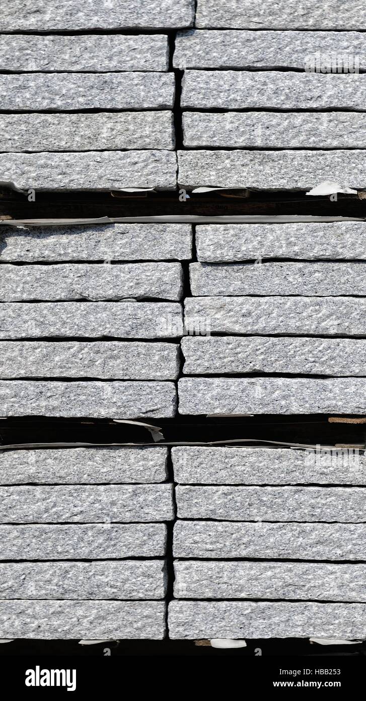 stacked building materials granite Stock Photo - Alamy
