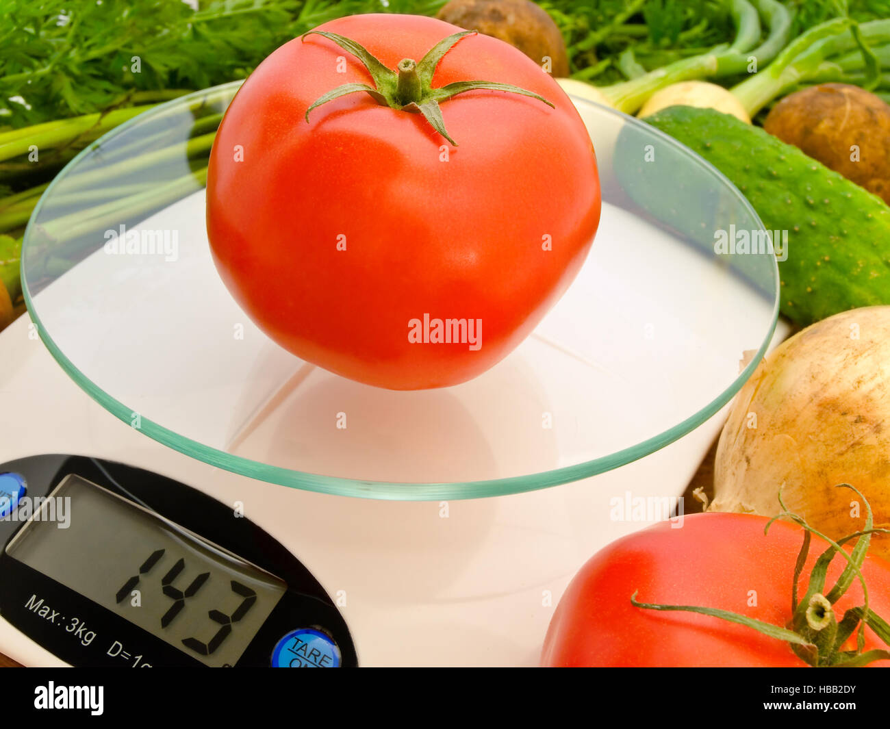Weighing scale tomatoes hi-res stock photography and images - Alamy