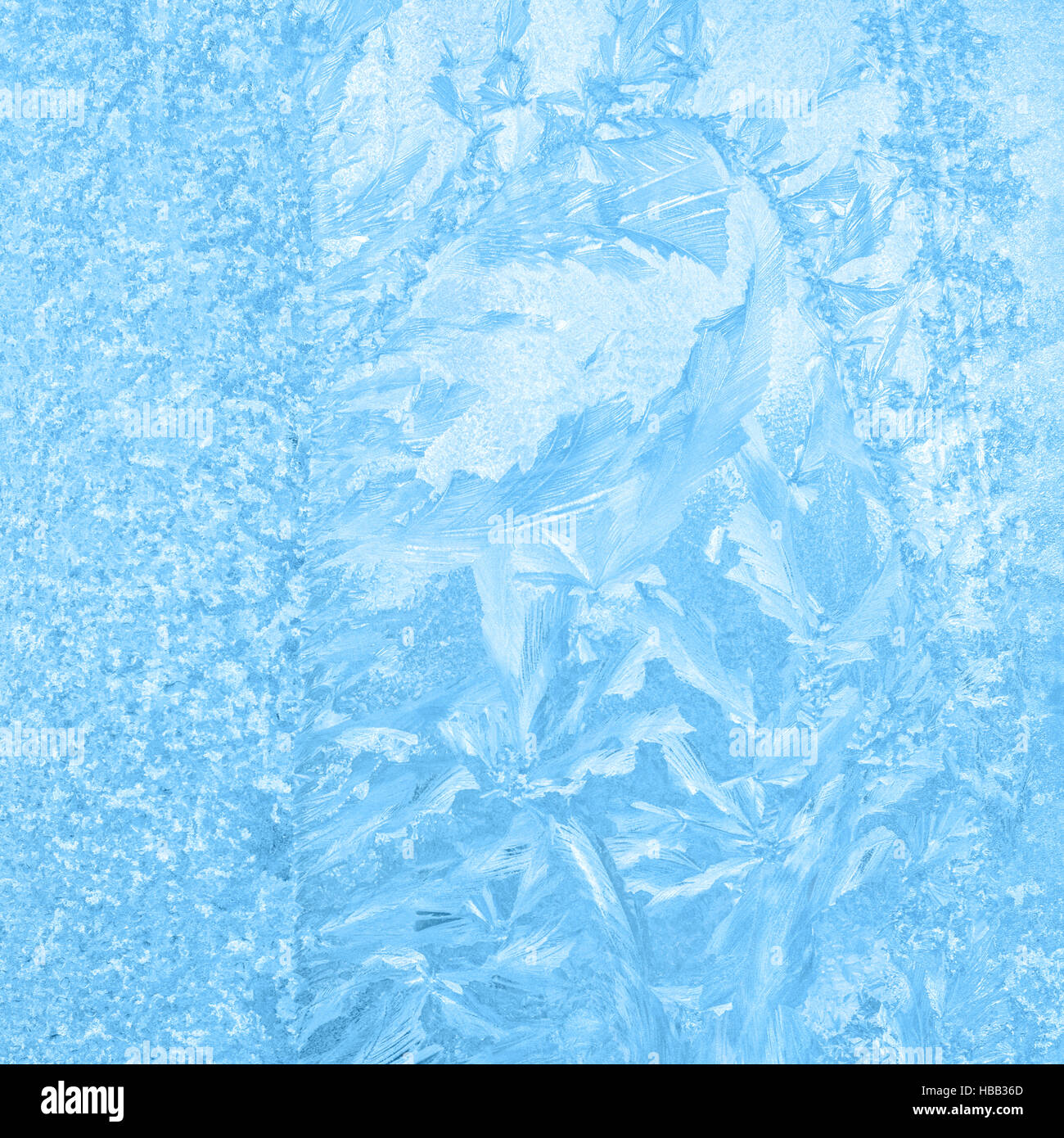 beautiful winter ice, blue texture on window, festive background, close ...