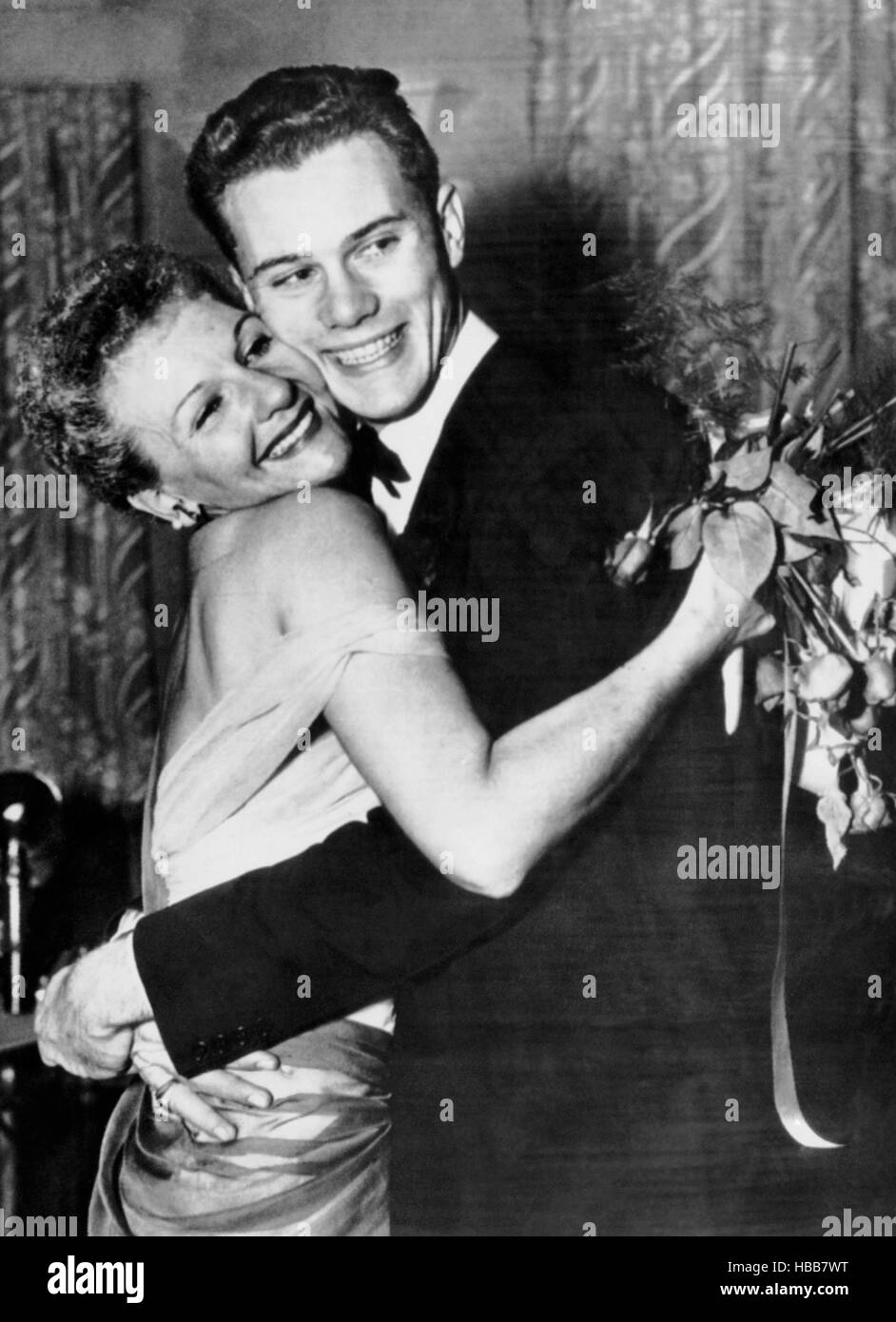 SOUTH PACIFIC, chorus boy Larry Hagman hugs his mother, Mary Martin ...