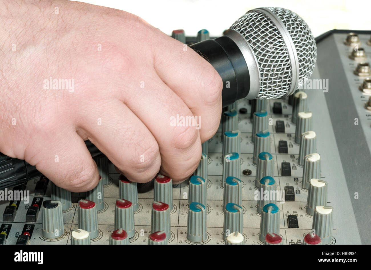 Hand with microphone Stock Photo - Alamy