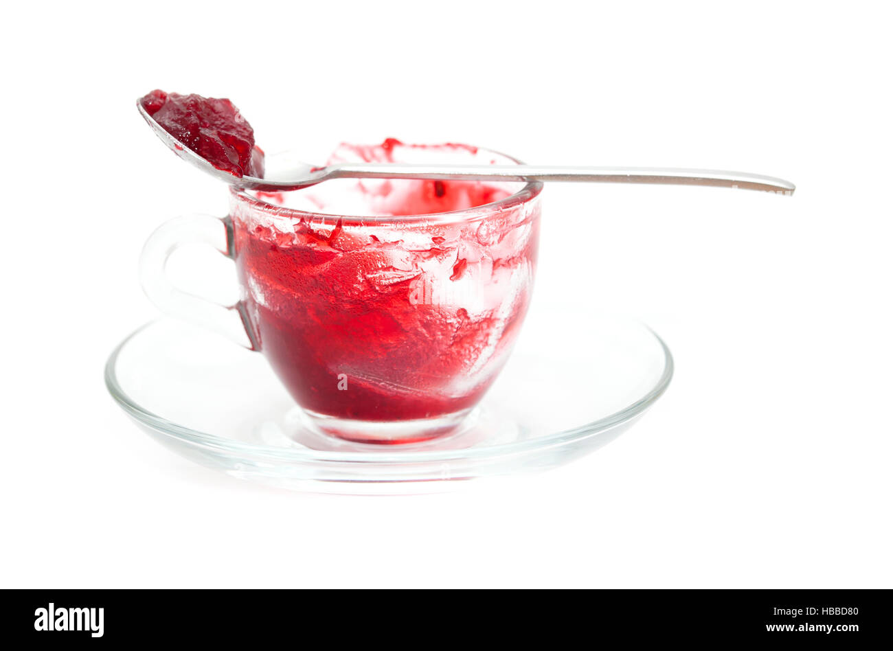 home-made individual berry jelly portion in a glass cup isolated Stock ...