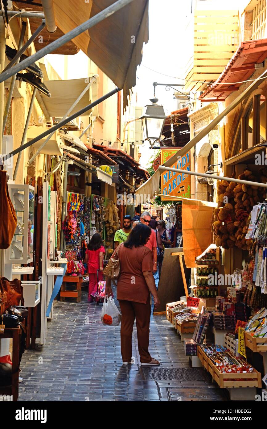 Tourists along a shopping street in the old town, Rethymno, Crete ...