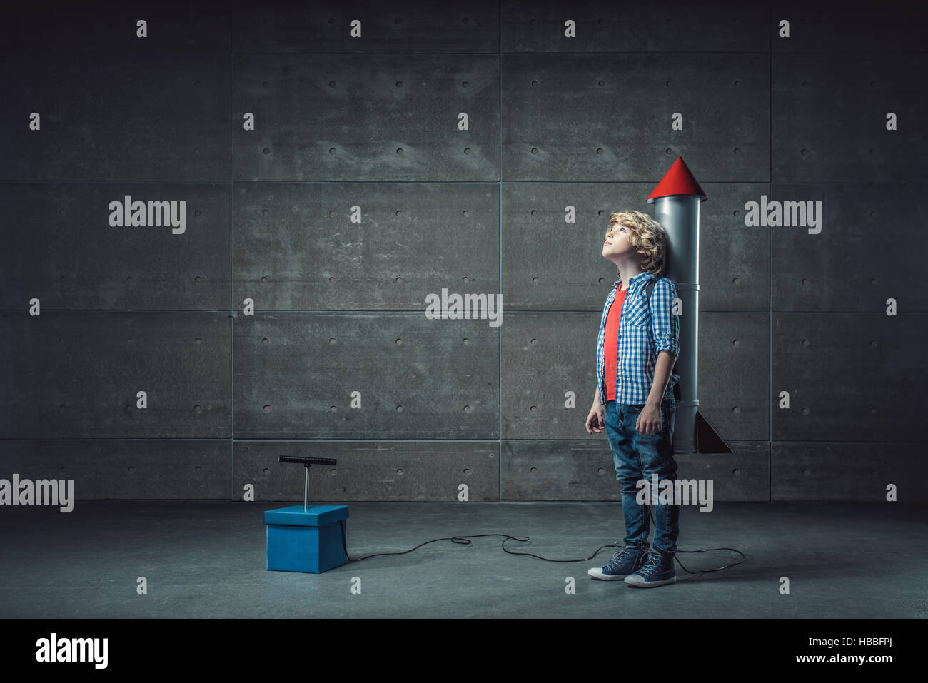 Boy with rocket Stock Photo - Alamy