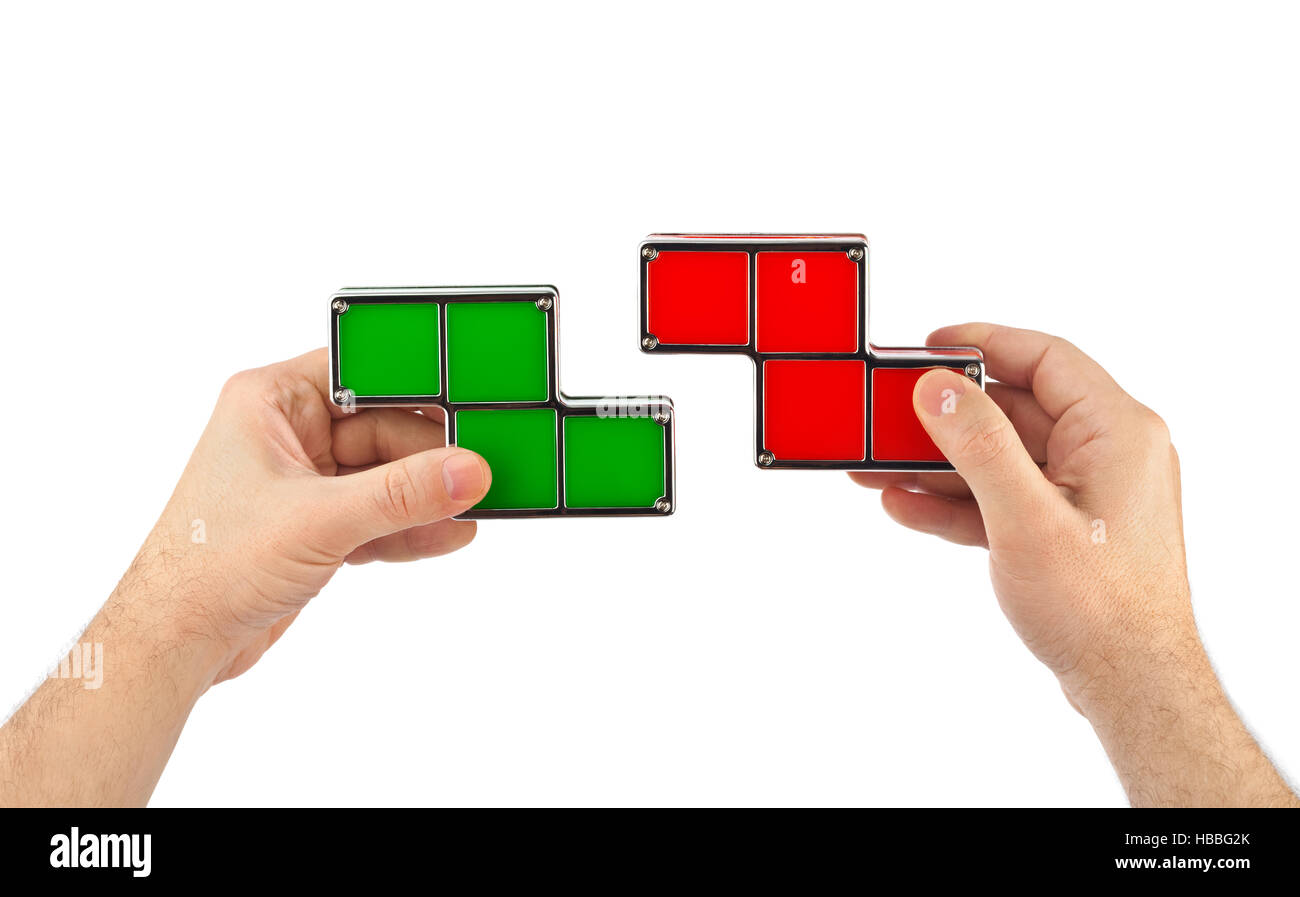 Hands with tetris toy blocks Stock Photo - Alamy