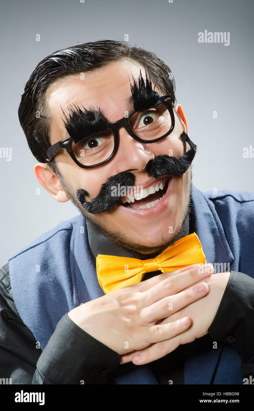 Funny man against dark background Stock Photo - Alamy