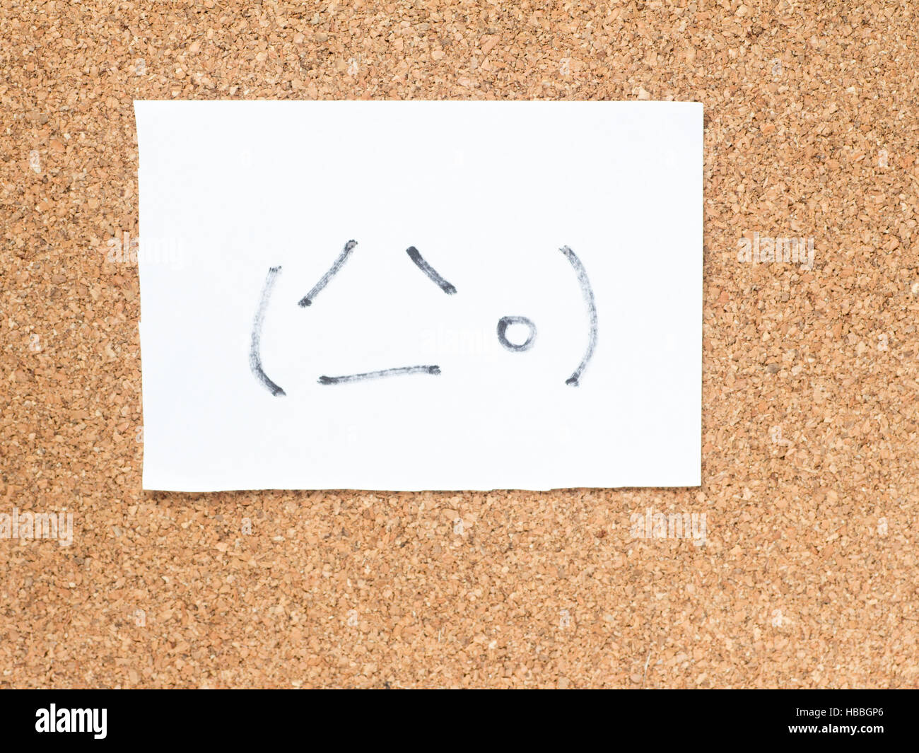 The series of Japanese emoticons called Kaomoji on the cork board ...