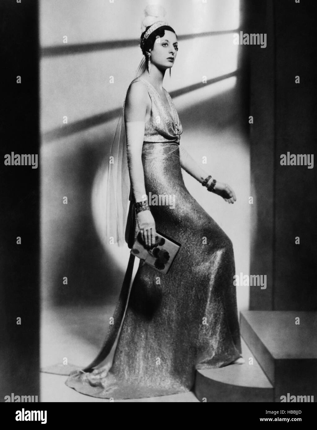 A Reville gown of rose-pink, and silver lame designed for women other ...