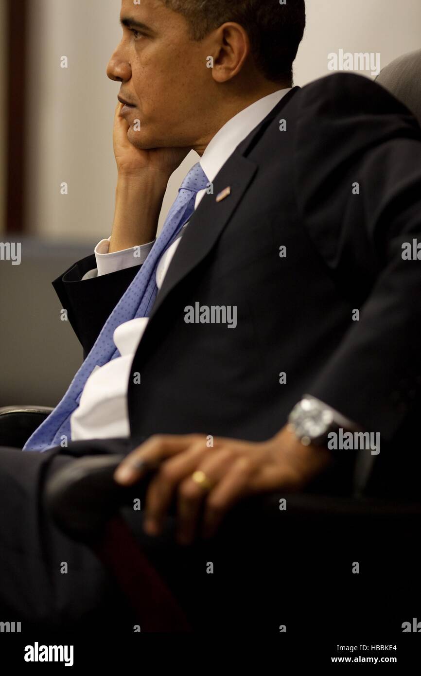 President Barack Obama listens during a meeting in the Situation Room ...