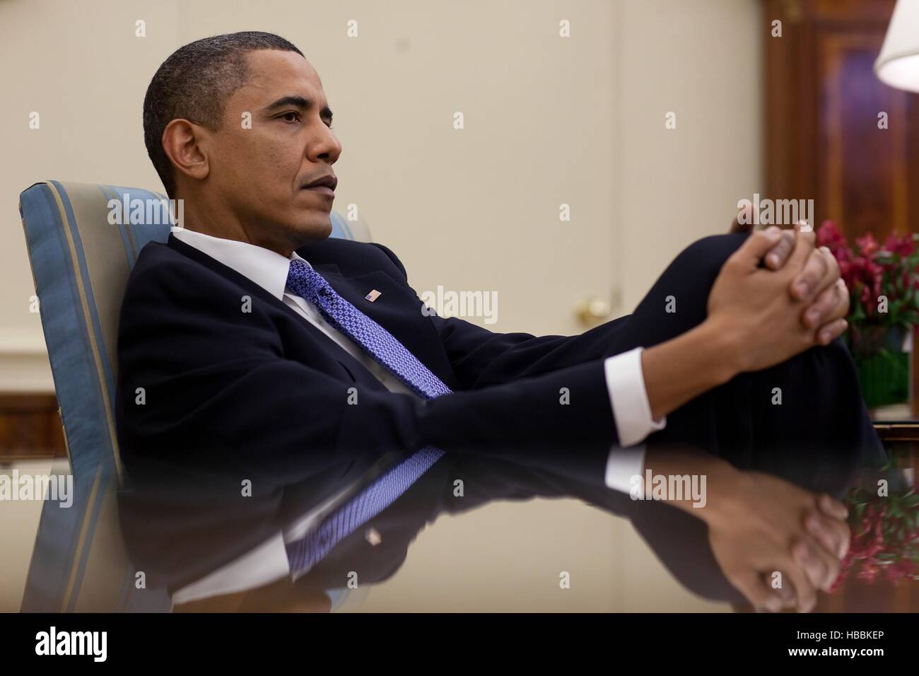 President Barack Obama leans back during a meeting in the Oval Office ...