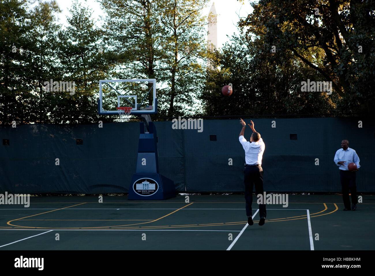 President Barack Obama shoots hoops with his personal aide Reggie Love ...