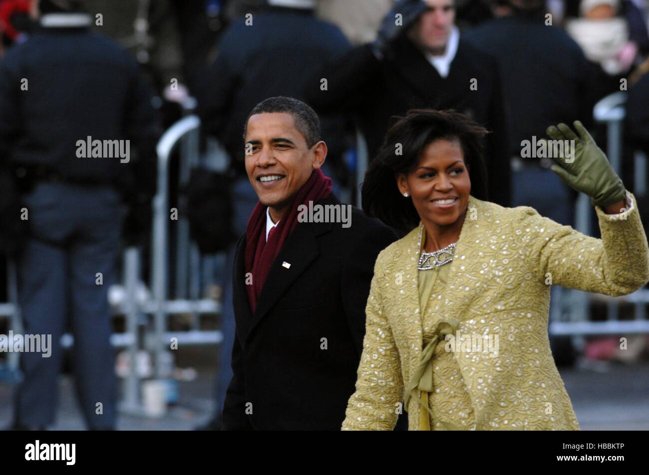 President and Michelle Obama wave to the crowd along Pennsylvania ...