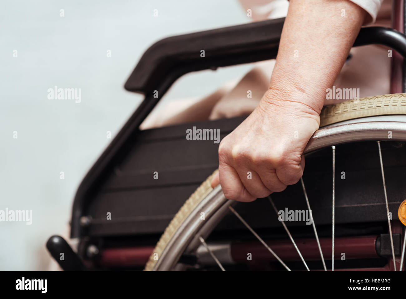 Elderly woman using wheelchair Stock Photo - Alamy