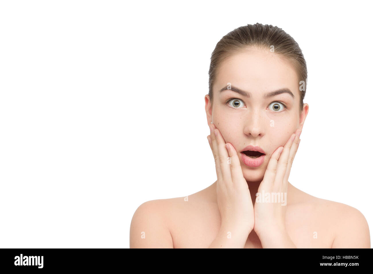 beautiful girl surprised isolated on white background with copyspace ...