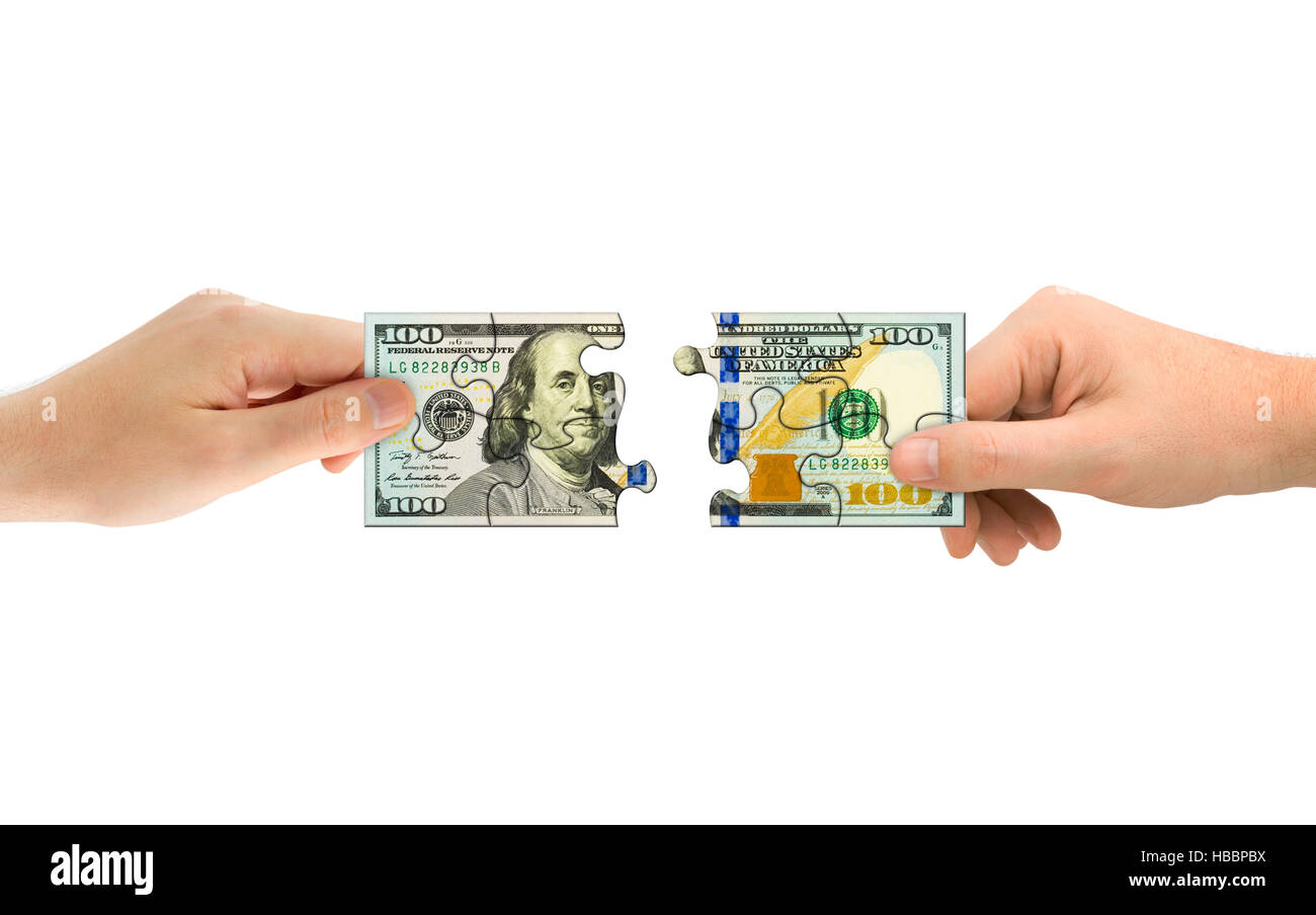 Hands and money puzzle Stock Photo - Alamy