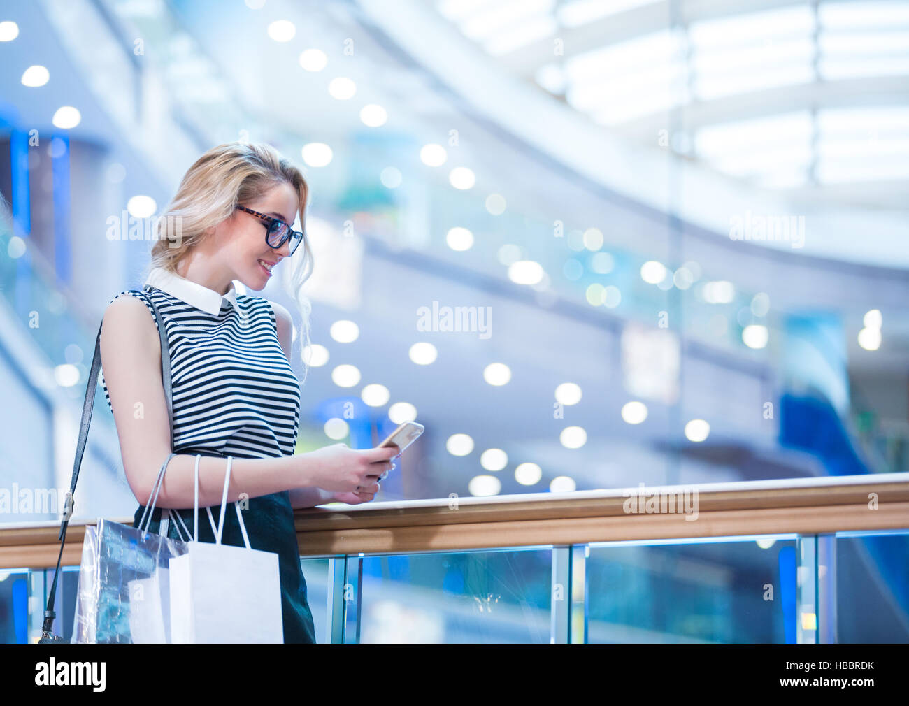 Girl in a store Stock Photo - Alamy