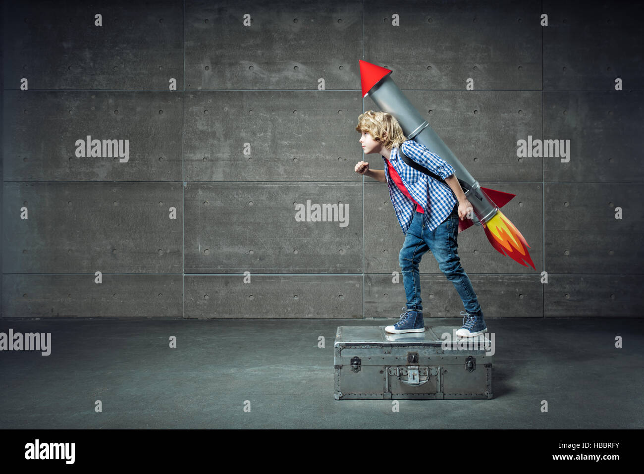 Boy with rocket Stock Photo - Alamy