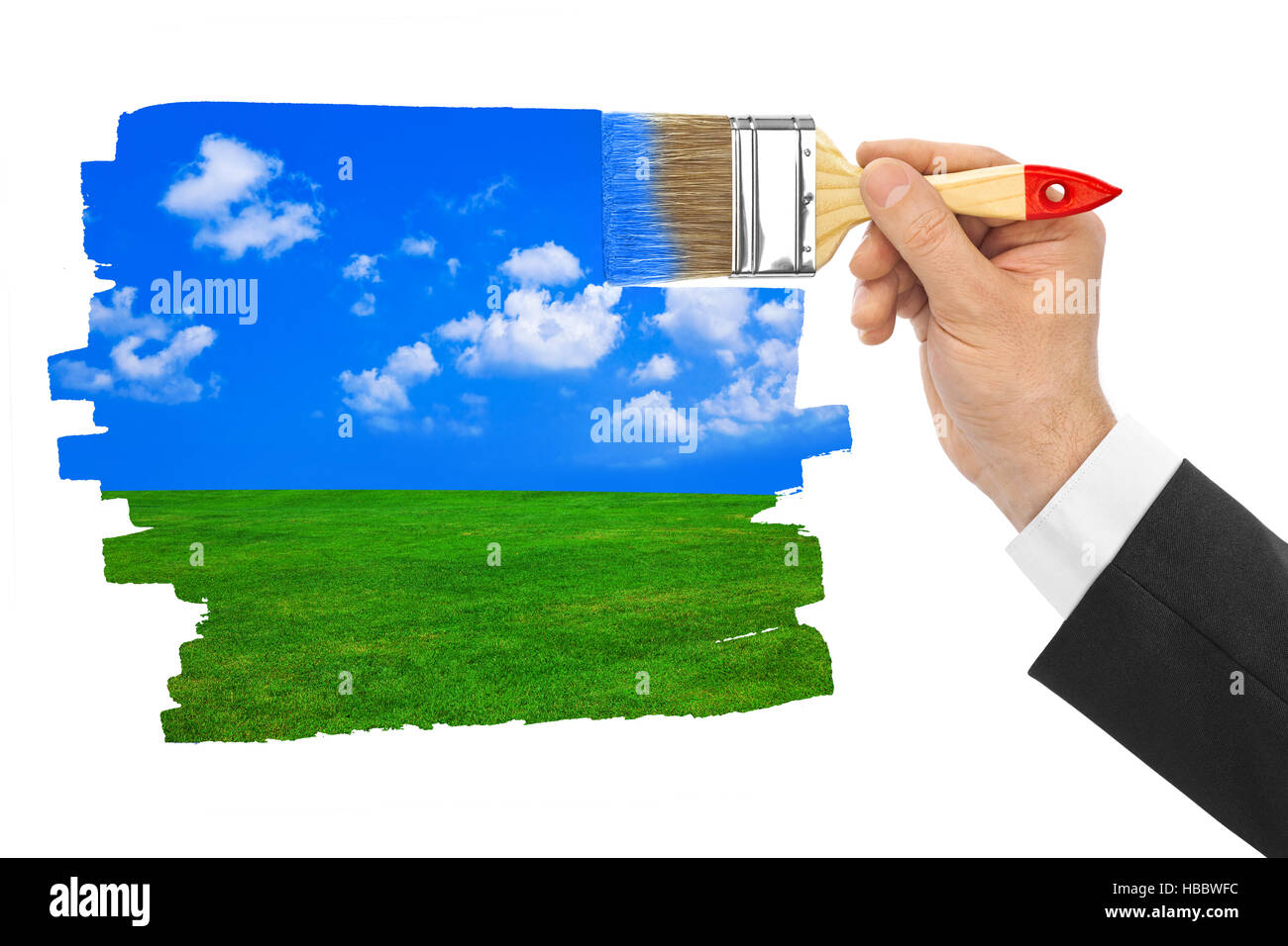 Hand with paintbrush drawing landscape Stock Photo - Alamy