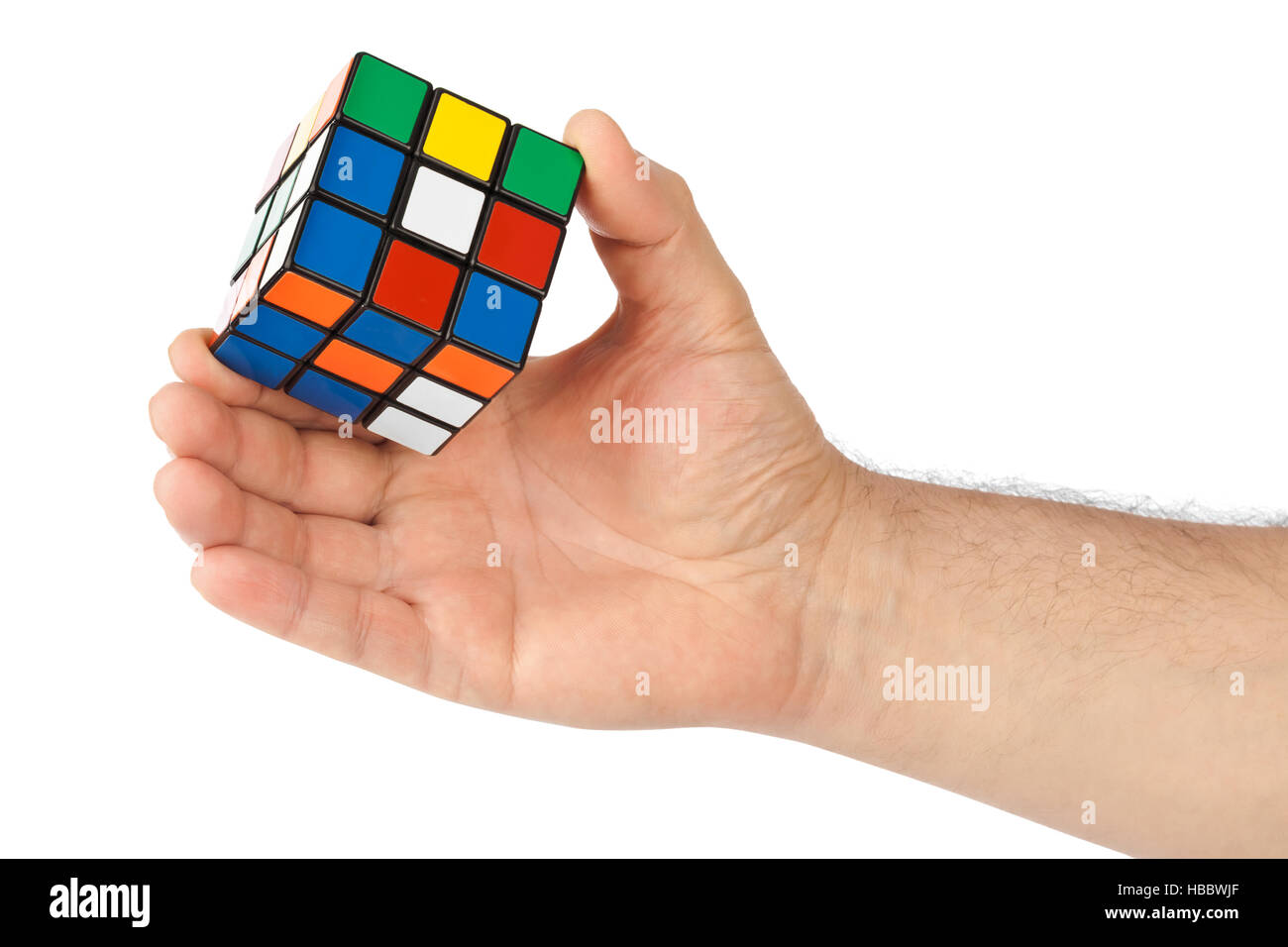 Cube puzzle in hand Stock Photo - Alamy