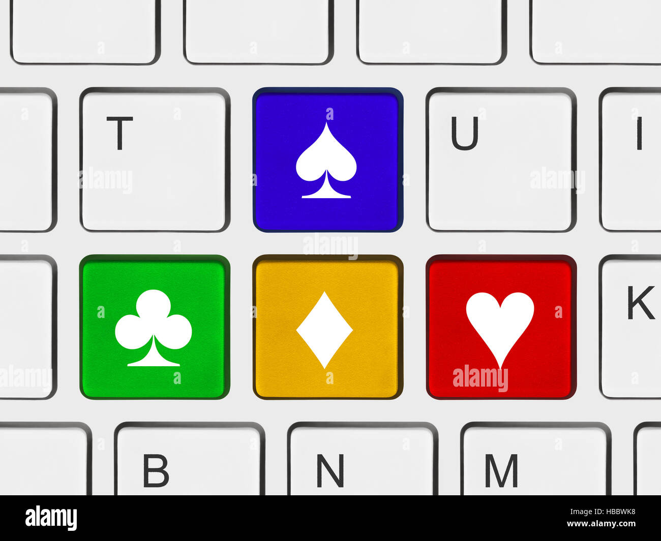 Computer keyboard with cards suit Stock Photo - Alamy