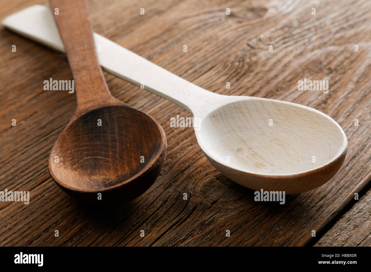 wooden spoons on an old kitchen table Stock Photo - Alamy