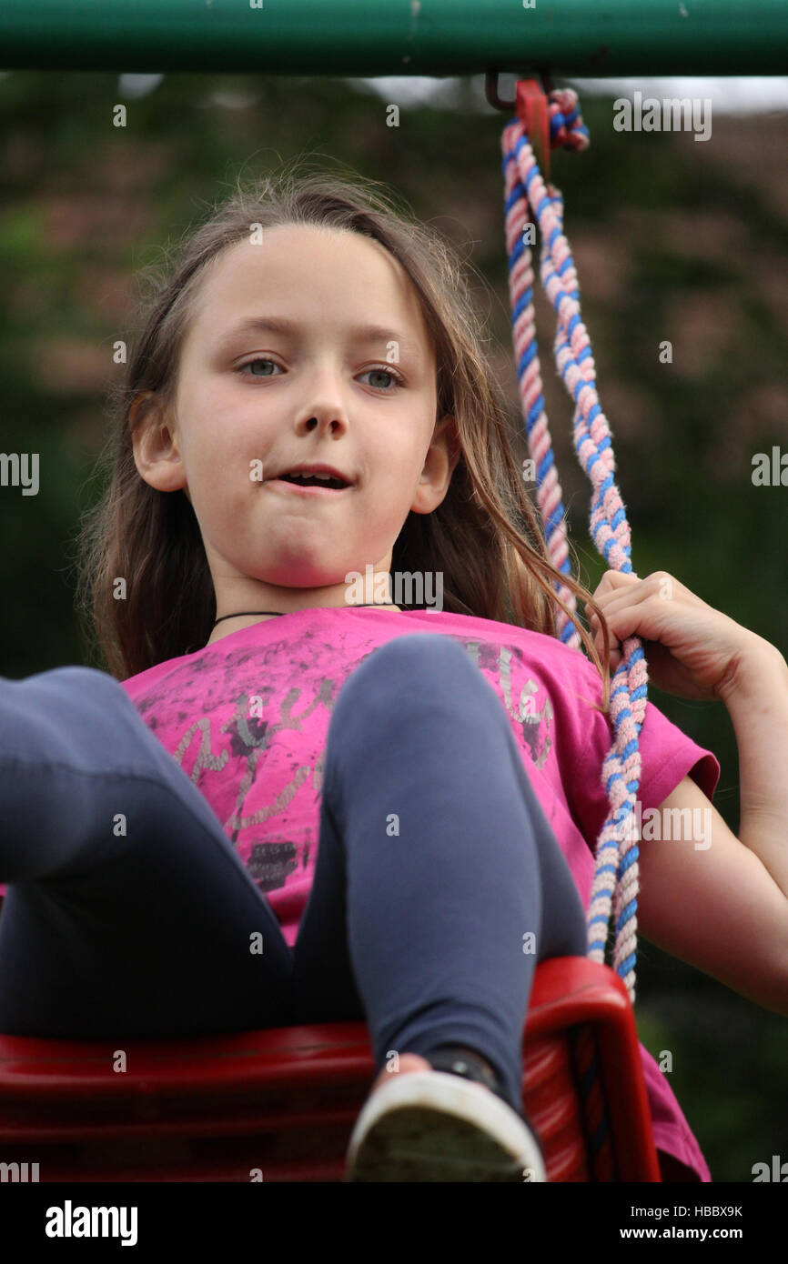 Children swing hi-res stock photography and images - Alamy