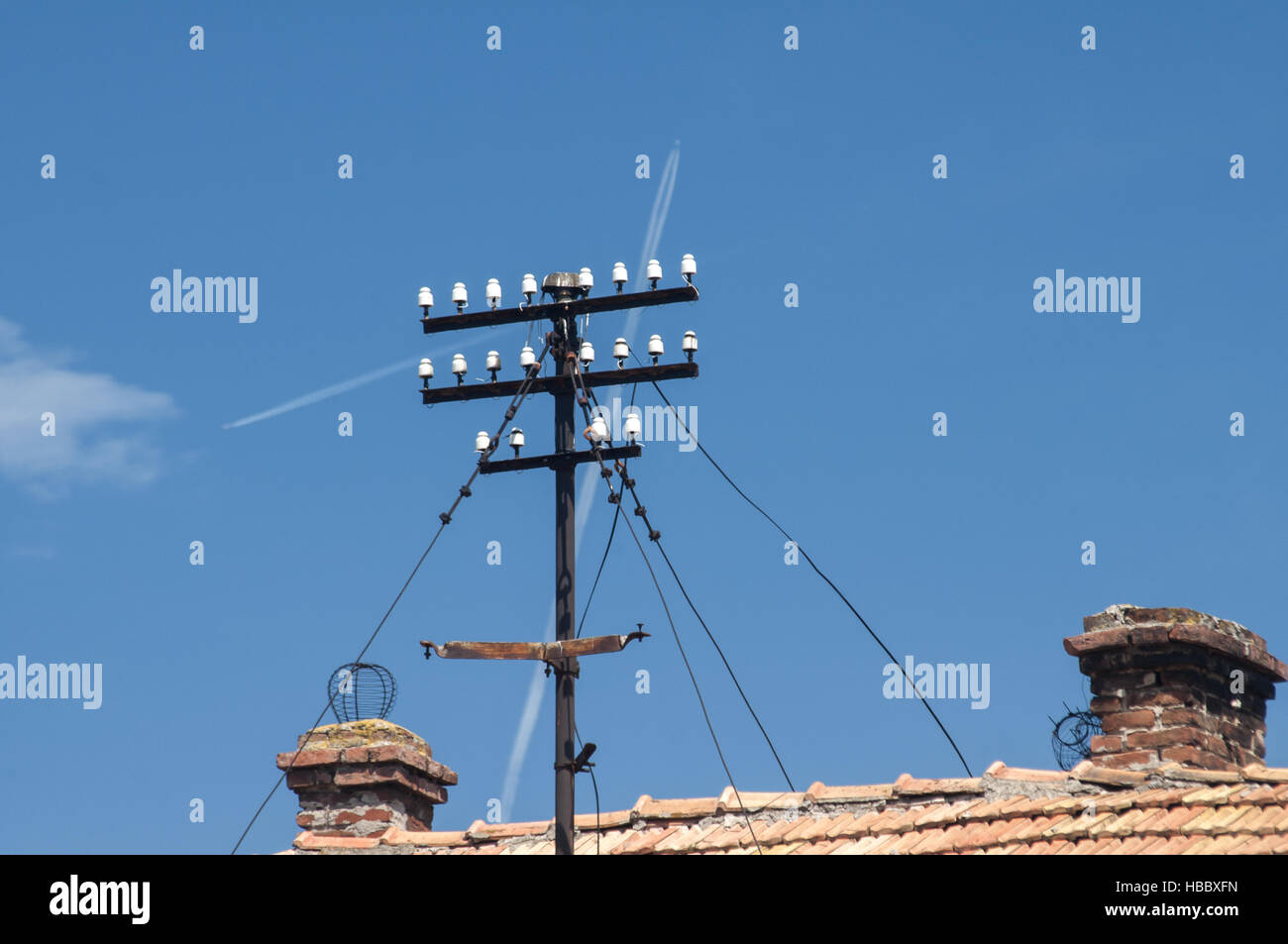 Electrical pillar on tiled roof Stock Photo - Alamy