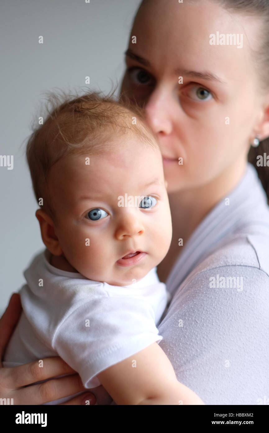 Three months old baby with mother Stock Photo - Alamy