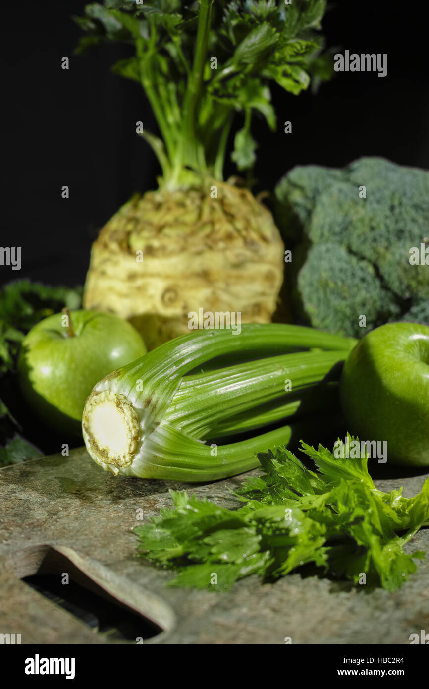 Green vegetables and fruits - celery, apples, celery root celeriac ...