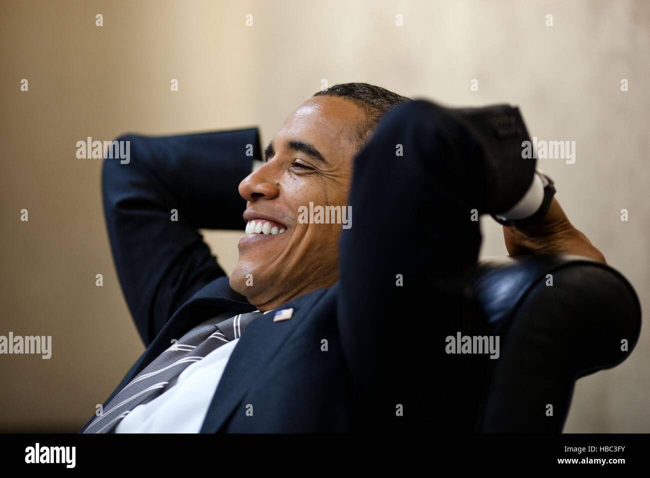 President Barack Obama has a relaxed moment in a meeting in the White ...