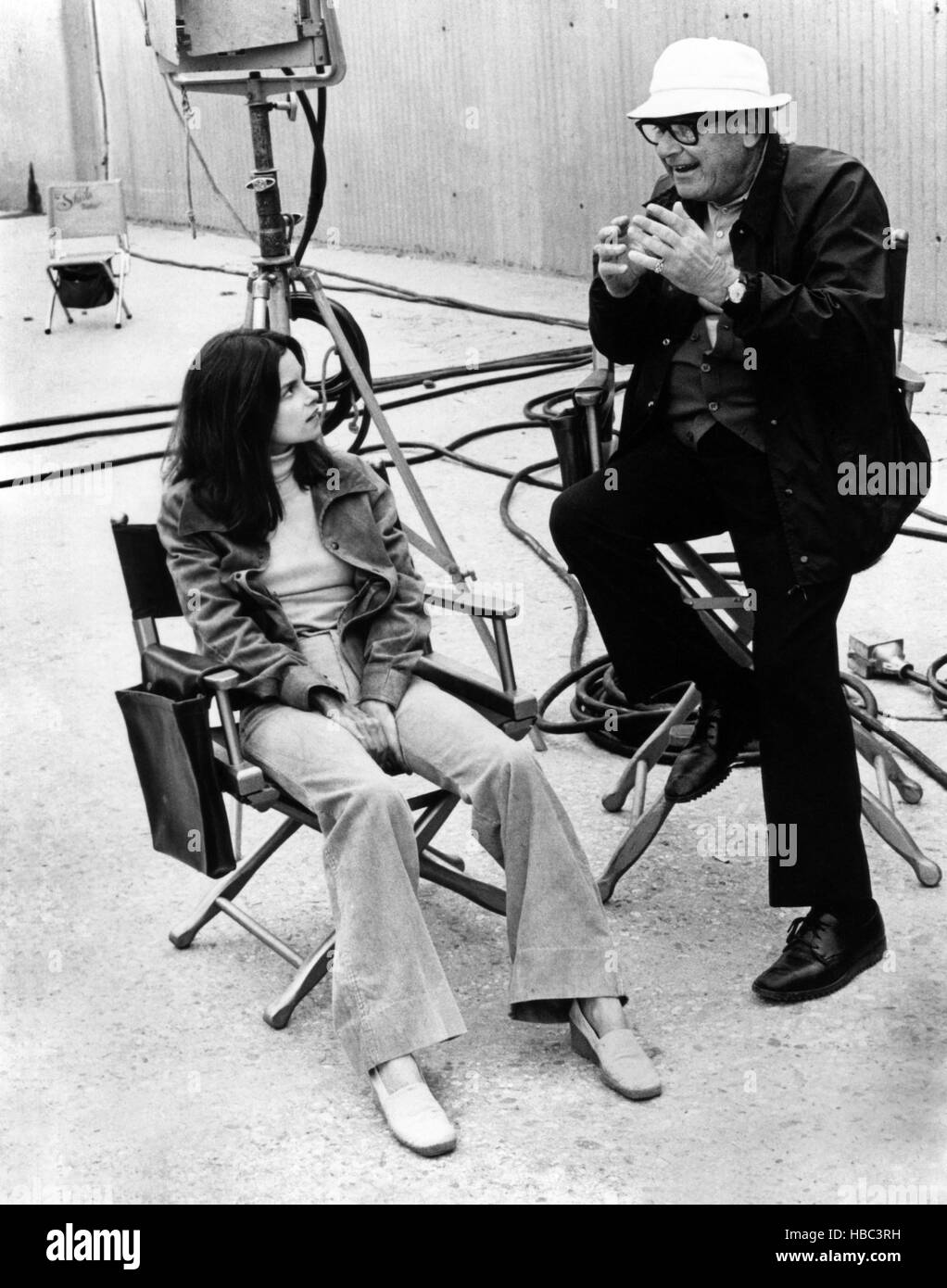 EARTHQUAKE, from left: Genevieve Bujold, Mark Robson. on set, 1974 ...