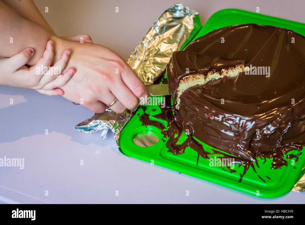 baby hands cut the cake Stock Photo - Alamy