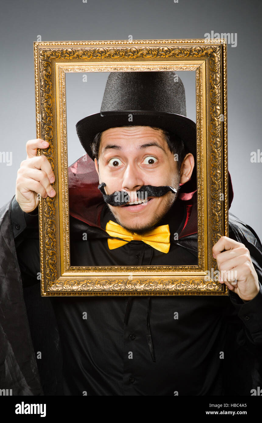 Funny man with picture frame Stock Photo - Alamy