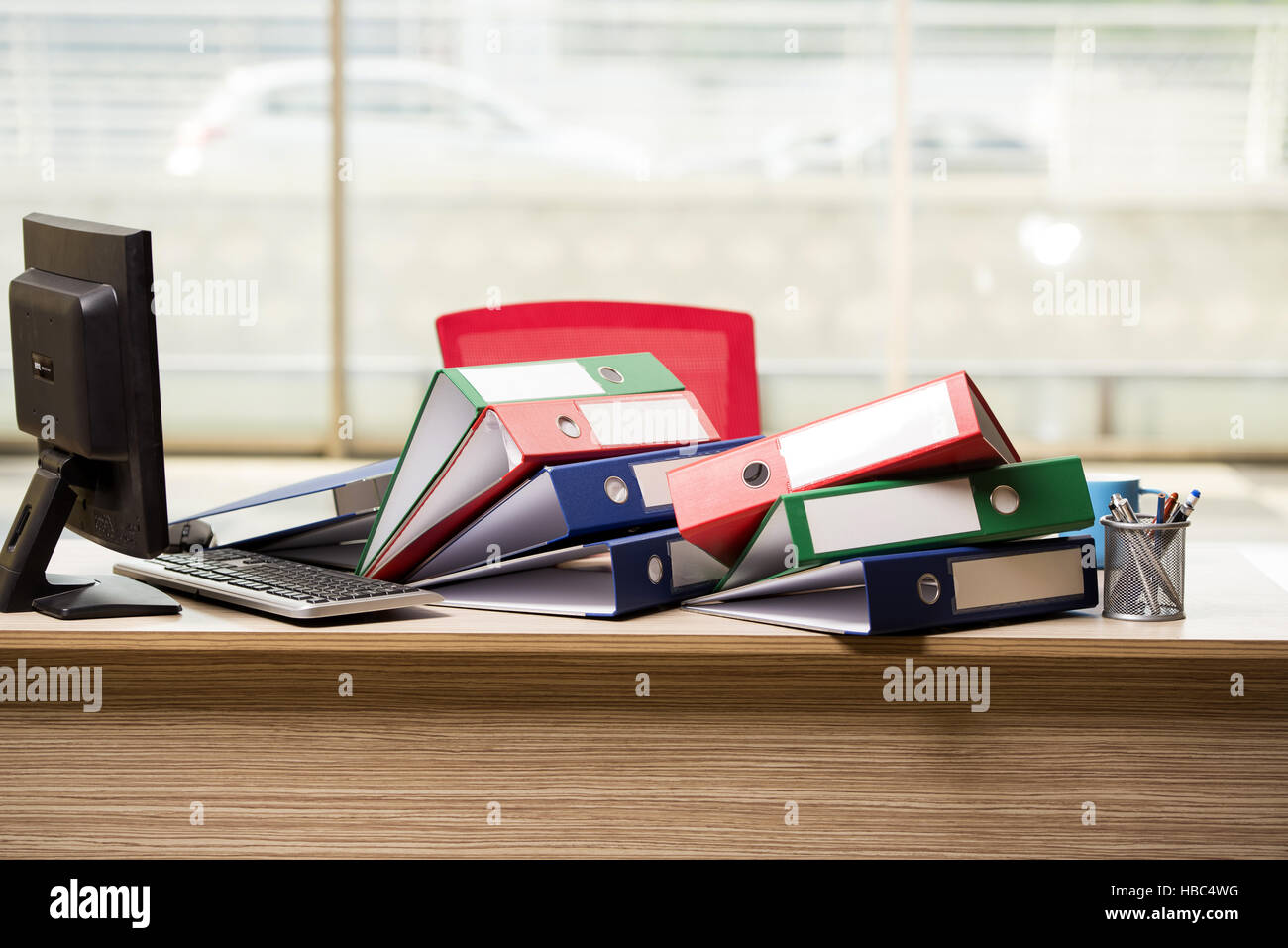 Stacks of office binders on desk Stock Photo - Alamy