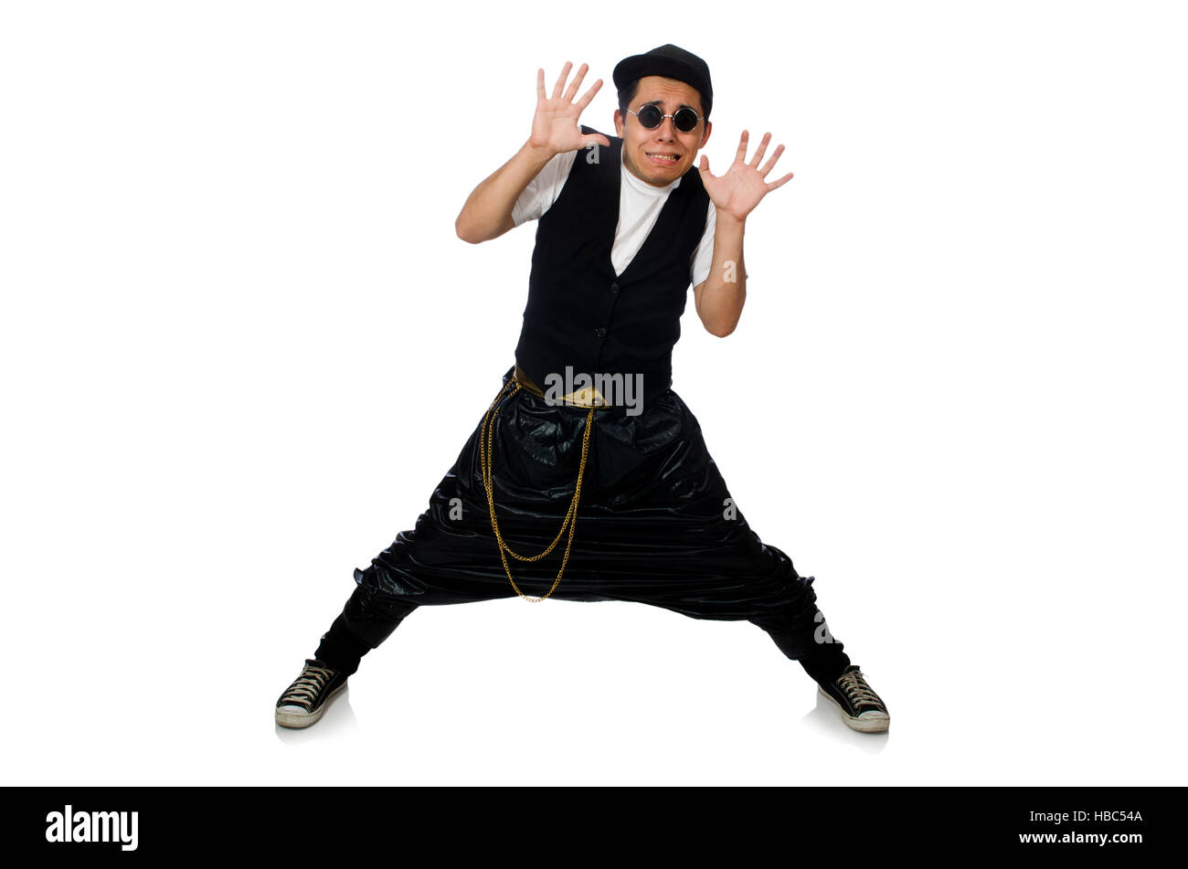 Funny young man dancing isolated on white Stock Photo - Alamy