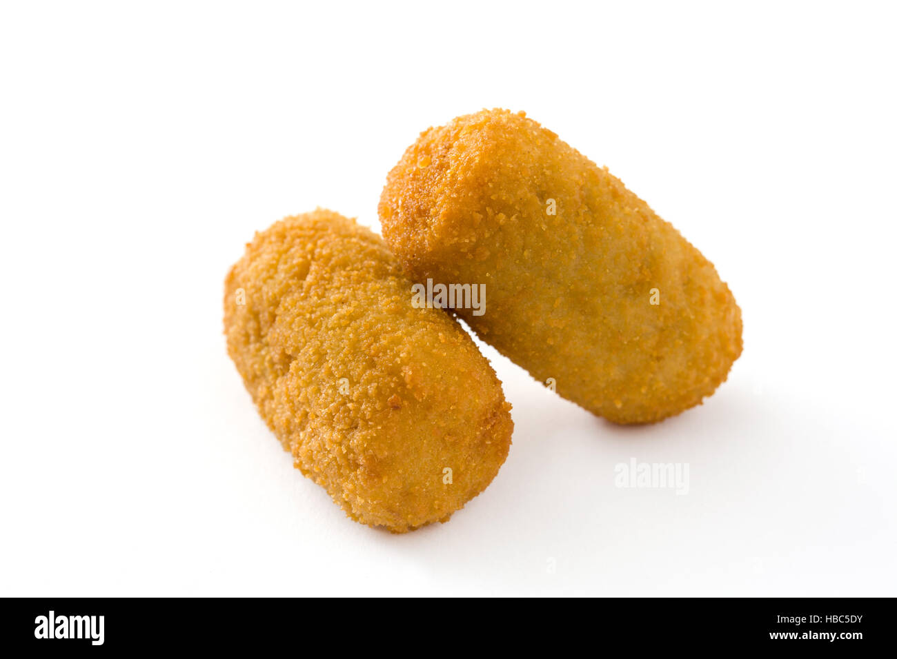 Traditional fried Spanish croquetas (croquettes) isolated on white ...