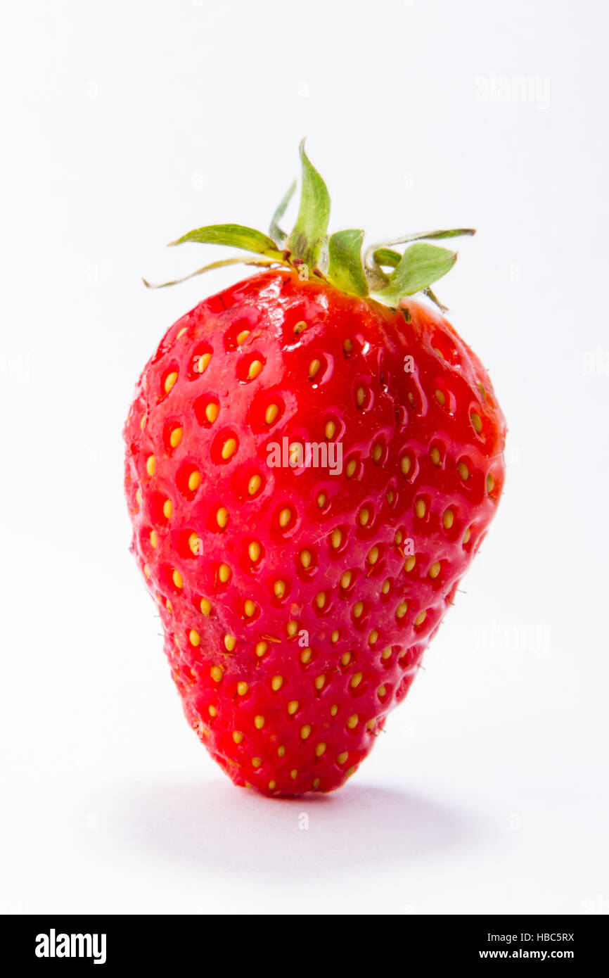 Group of bright red shiny strawberries hi-res stock photography and ...